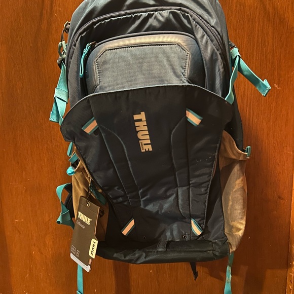 Thule | Bags | Thule Blue And Tan Outdoor Backpack | Poshmark